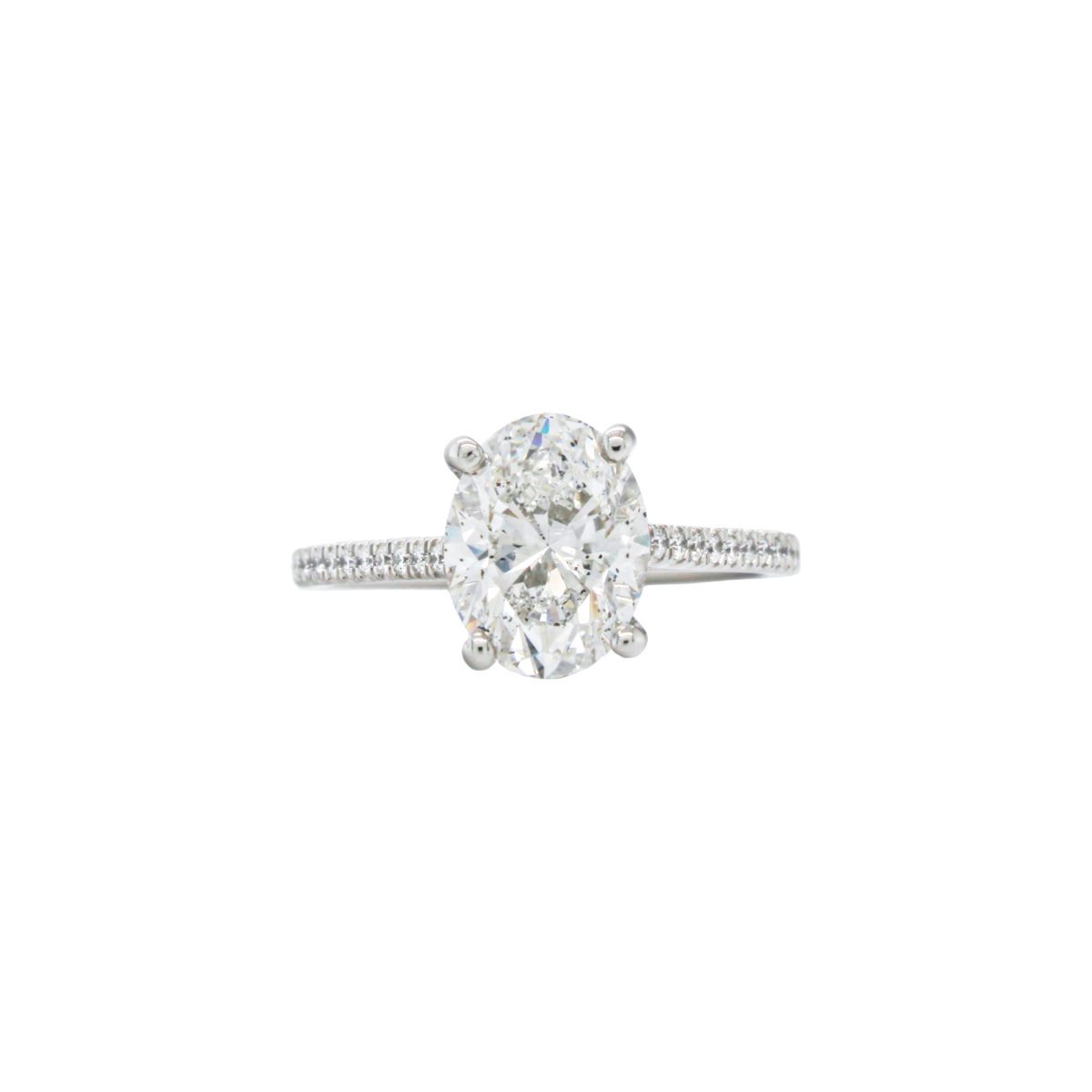 Pavé set Oval-cut Diamond Engagement Ring in Platinum